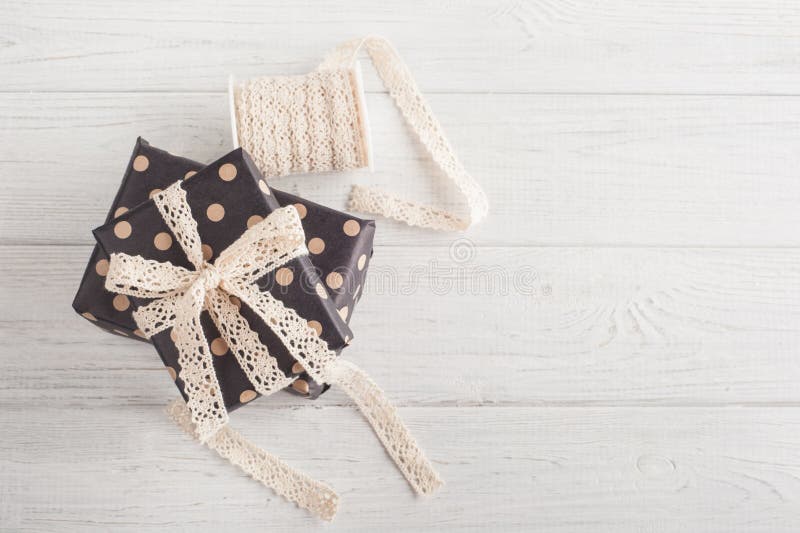 Gift boxes and lace ribbon stock image. Image of scrap - 100378879
