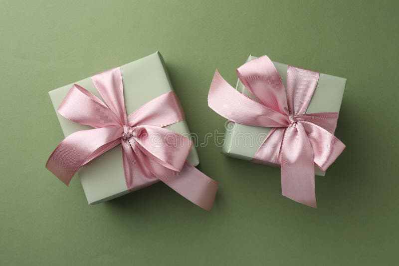 Gift Boxes with Pink Bows on Green Background, Top View Stock Image ...