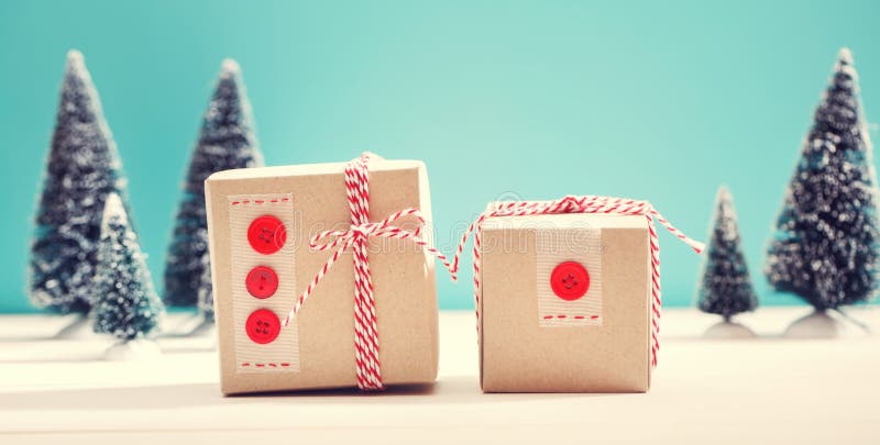 Gift Boxes in a Snow Covered Miniature Forest Stock Image - Image of ...