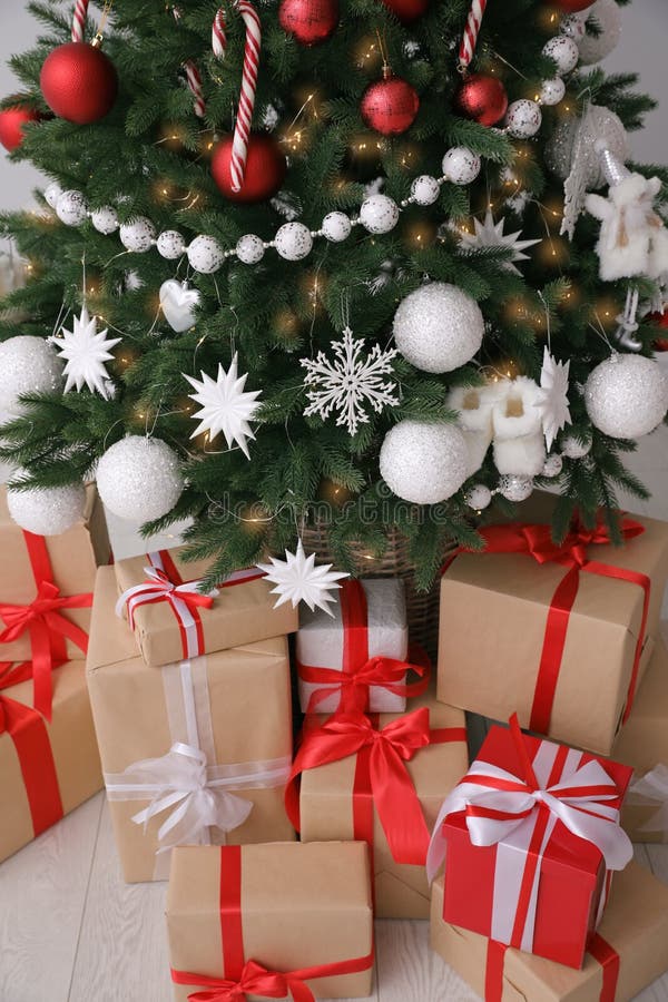 Gift Boxes Under Decorated Christmas Tree Indoors Stock Photo - Image ...