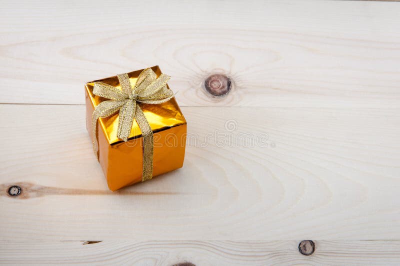 Gift Boxes on a Wooden Floor Stock Photo - Image of branch, silver ...