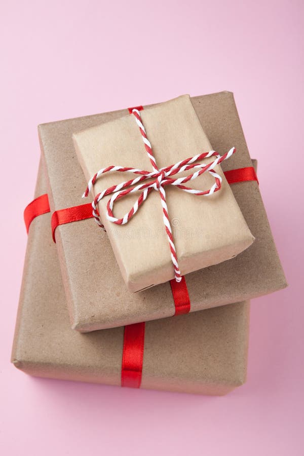 Gift Boxes Wrapped in Recycled Paper with a Ribbon Bow Stock Image ...