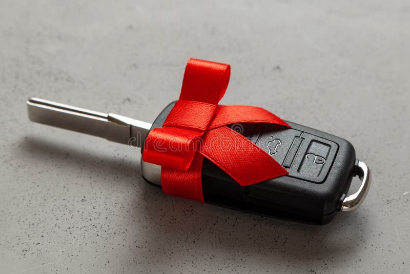 Gift Car Keys with Remote Control Alarm with Red Ribbon with Bow. Gray ...