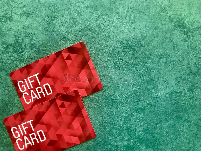 A Red Gift Card on Green Background. Stock Photo - Image of beneficial ...