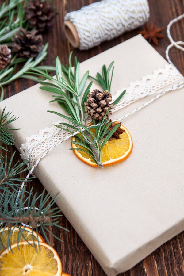 Gift in a Craft Package on the Wooden Table. Handmade Gift Preparation ...