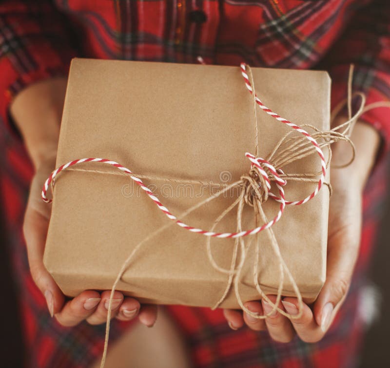 Gift on female hands stock image. Image of birthday - 200868777
