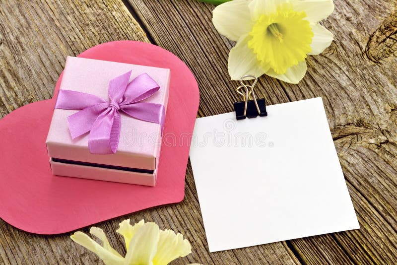 Gift of flowers and a note stock image. Image of light - 41015425