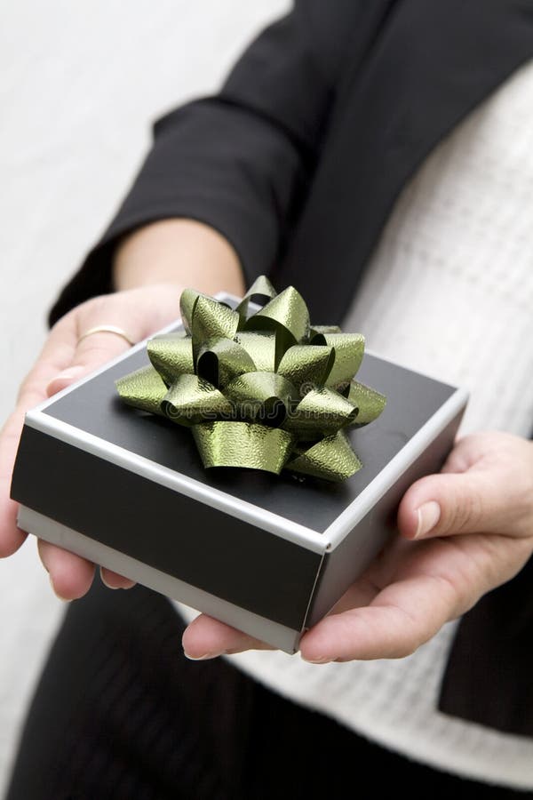 Gift giving stock photo. Image of green, gold, holiday - 6990178