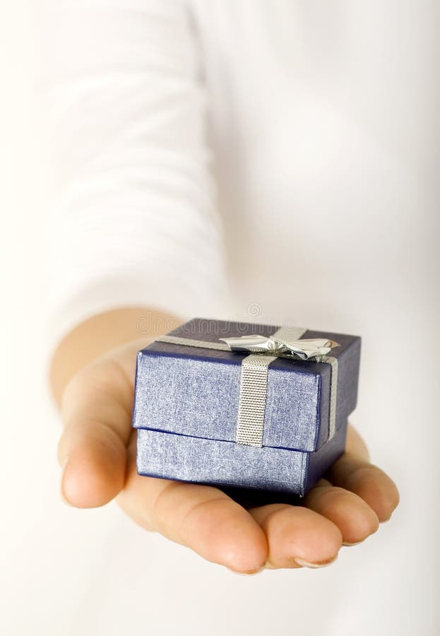 Gift in hand stock image. Image of decoration, hand, hands - 17006117