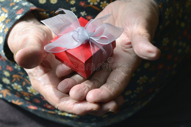 Gift on hand stock photo. Image of cheerful, celebrate - 27797608