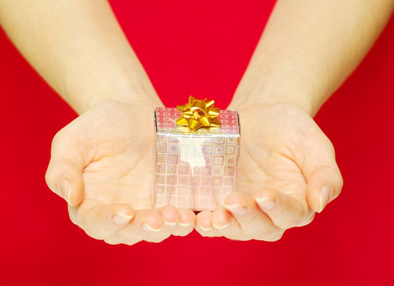 Gift in hands stock photo. Image of hand, finger, christmas - 13339372