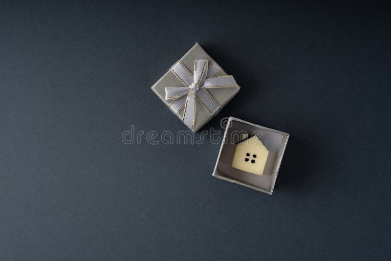Gift House Concept with Little Toy House in a Gift Box Stock Image ...