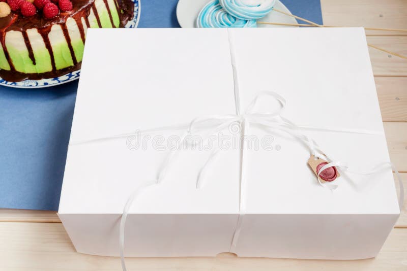 Gift paper box with cake. stock image. Image of sweet - 76776819