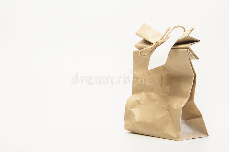 Gift Paper Parchment Bag with Bow and Note. on White Background Stock ...