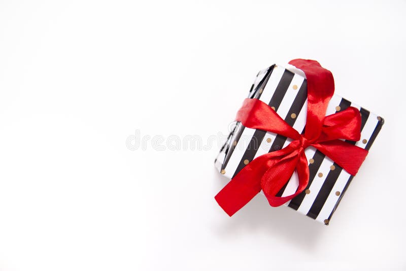 Gift or Present Box in White and Black Stripes with a Red Ribbon Bow ...