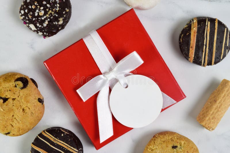 Gift Tag Mockup Styled on Present with Cookies Stock Photo - Image of ...
