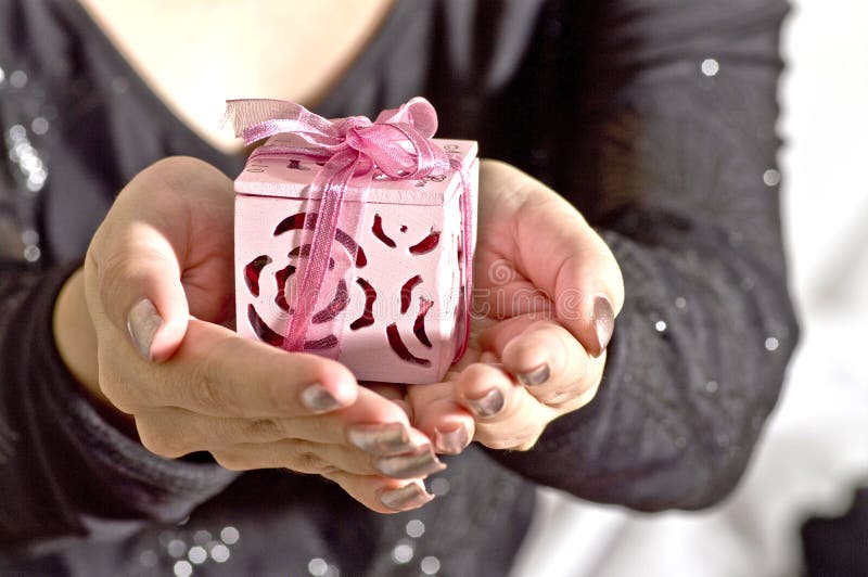 A gift in woman hand stock image. Image of give, gift - 17235785