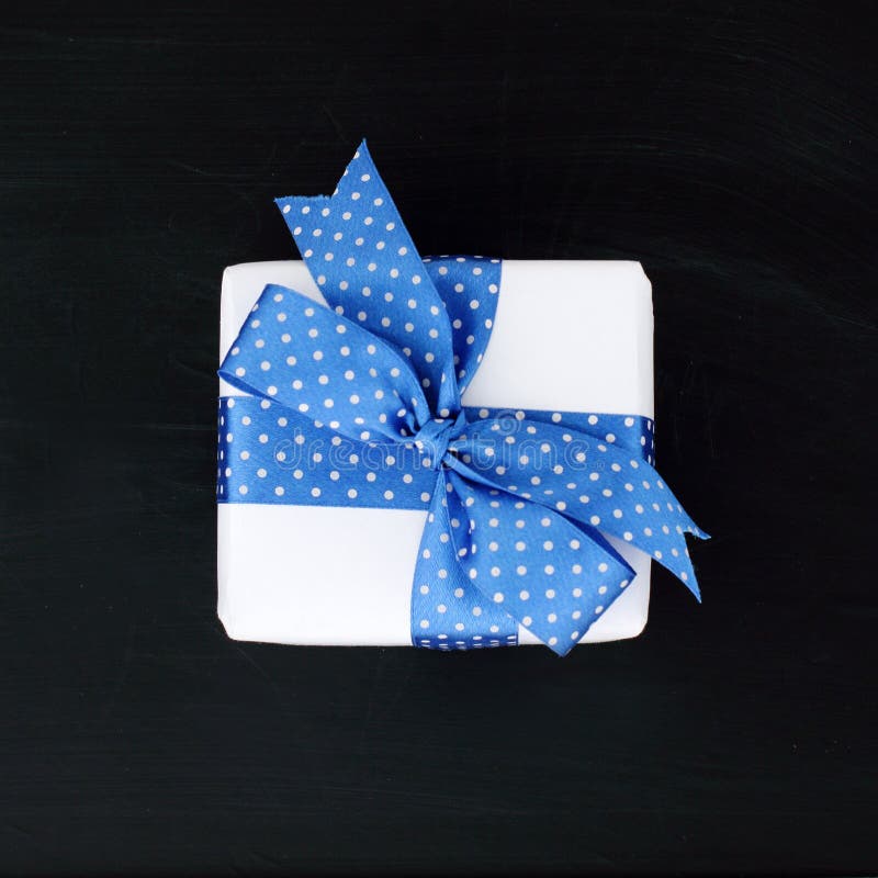 Gift Wrapped in Blue Ribbon with Polka Dots Stock Photo - Image of ...