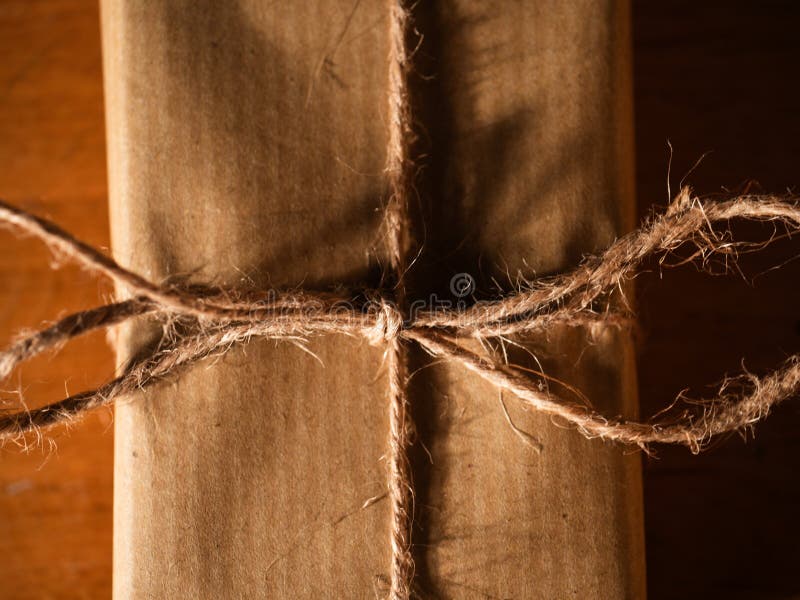 Gift Wrapped in Brown Paper and String Stock Photo - Image of party ...