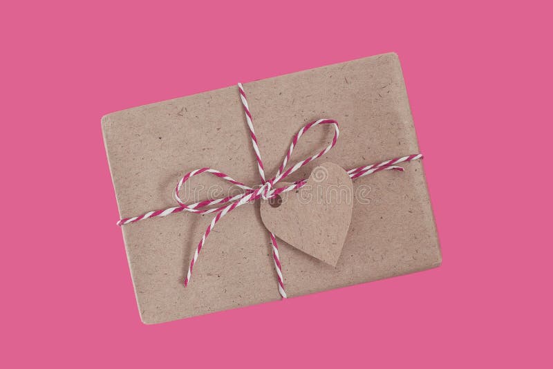 Gift Wrapped on a Craft Paper and Decorated Heart on the Pink ...
