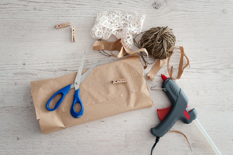 Gift Wrapping with Boxes and Scissors Over Wooden Table Stock Photo ...