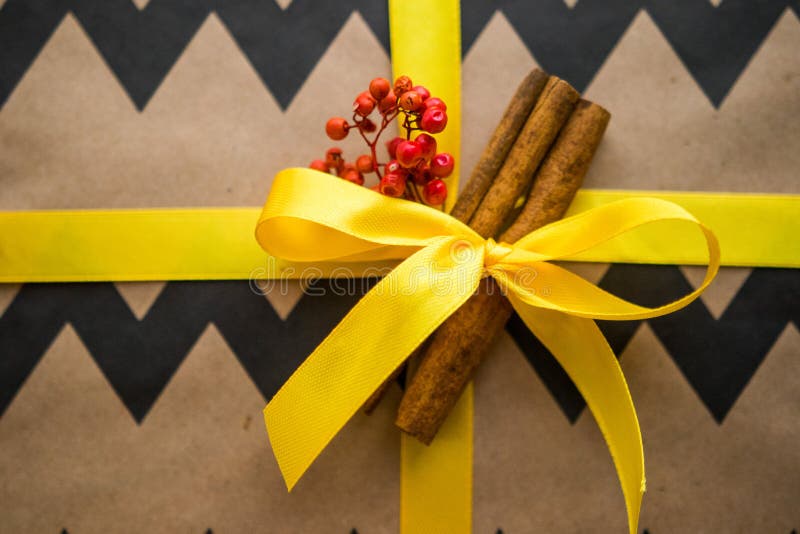 Gift with a Yellow Ribbon / Gift Box Tied with a Yellow Ribbon Stock ...