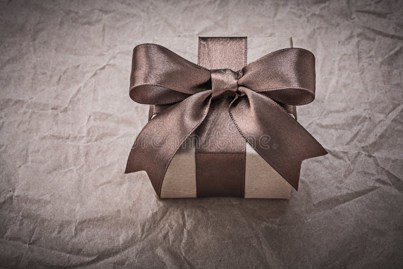 Giftbox with Present Ribbon on Wrapping Paper Holidays Concept Stock ...