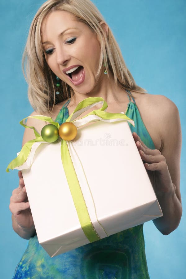 Gifts bring a smile stock image. Image of expression, receiving - 344603