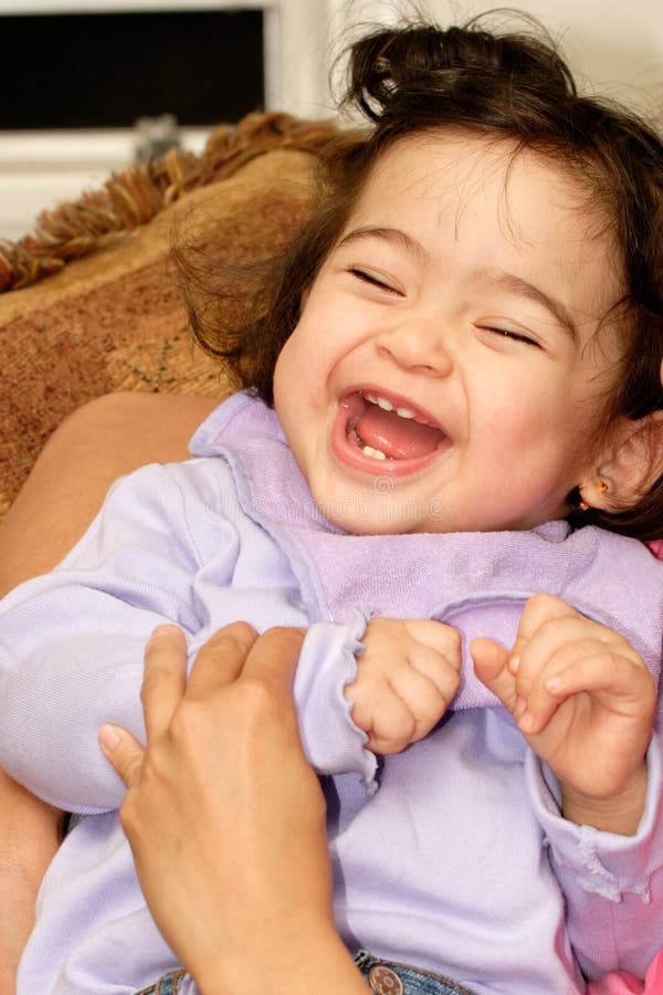 Giggling baby girl stock photo. Image of smile, childhood - 557936