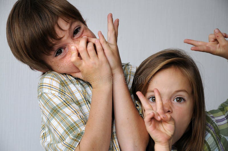 Giggly siblings stock image. Image of sibling, freckle - 22798463