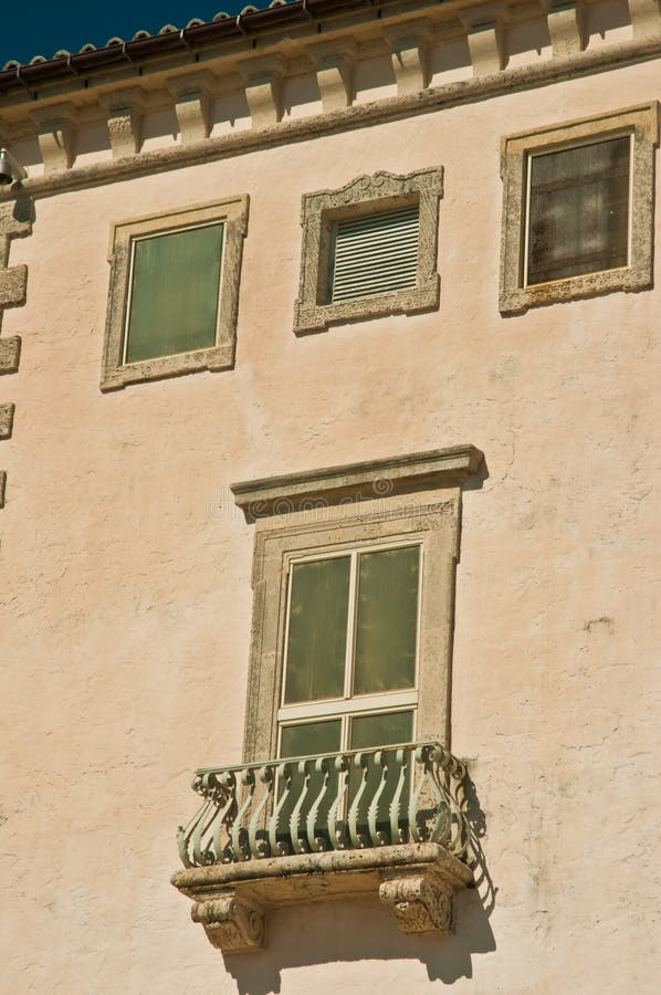 Gilded Building with Window and Metal Railing Stock Photo - Image of ...