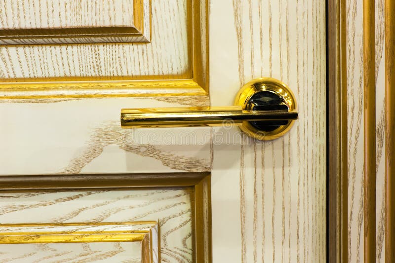 Gilded Handle on Beige Door Stock Image - Image of domestic, concepts ...