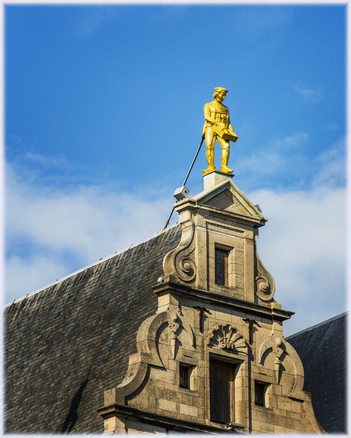 The Gilded Statue on the Top of Guild Houses in Antwerp, Belgium Stock ...