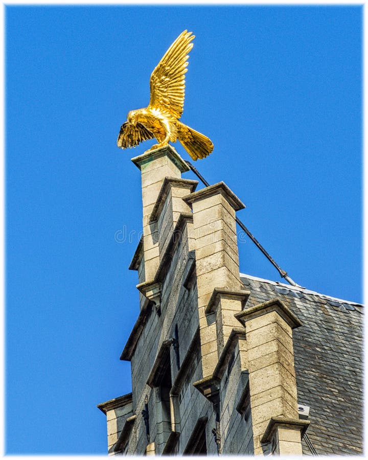 The Gilded Statue on the Top of Guild Houses in Antwerp, Belgium Stock ...
