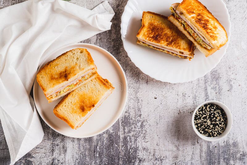 Gilgeori Toast with Cabbage, Carrot, Ham and Cheese on a Plate on the ...