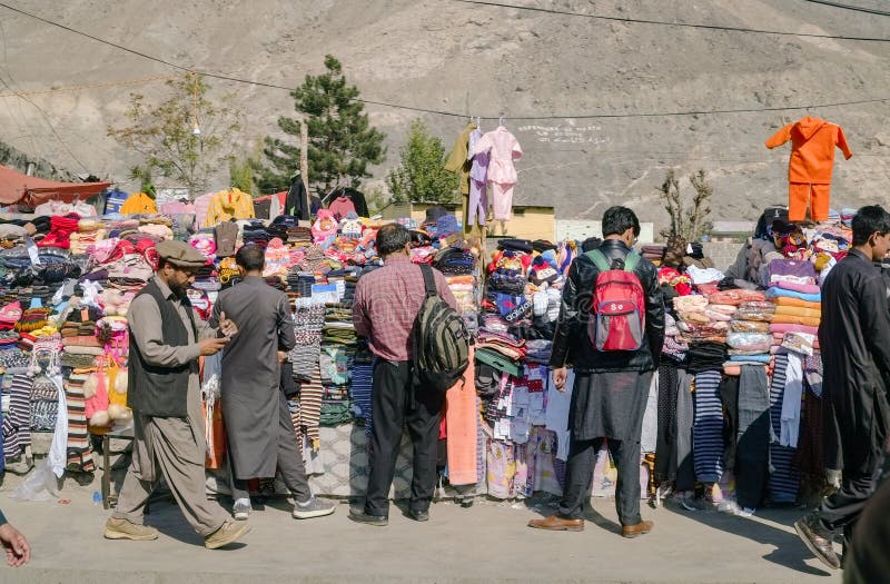 People Choosing Goods at a Local Clothes Stall. Editorial Photo - Image ...