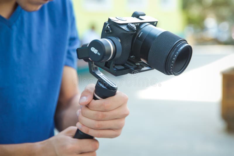 Gimbal Operator with Black Equipament - Stabilizer and Camera ...