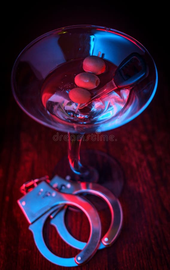 Cocktail and handcuffs stock photo. Image of studio, drink - 13245870