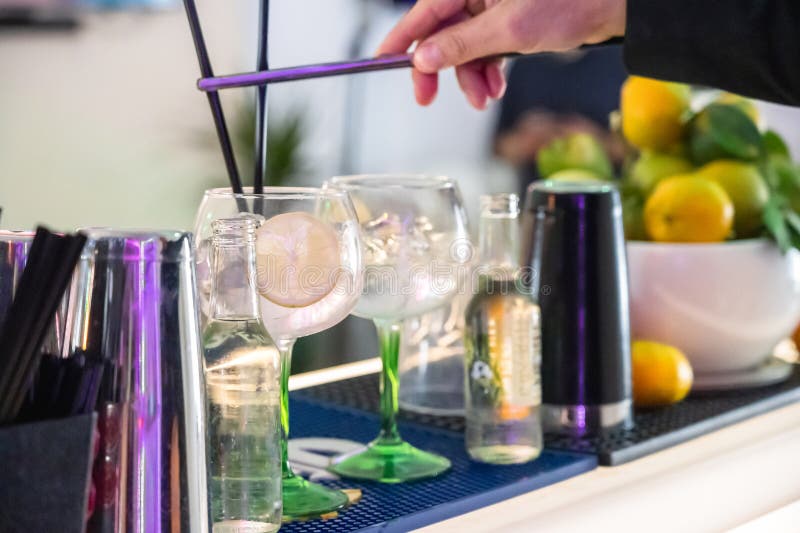 Process of Preparing a Gin Tonic Cocktail Close-up at a Bar Counter ...