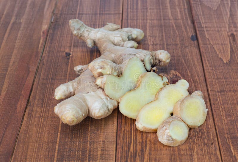 Ging Root Sliced on Woodeern Table Stock Image - Image of ginger ...