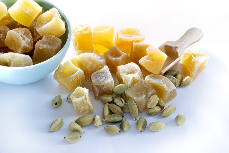 Ginger Candy and Cardamom Pods on a White Backround Stock Image - Image of crystallized, spice ...