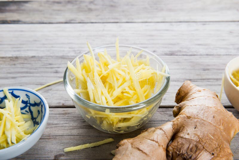 Ginger Cut Into Strips On Wooden Table Stock Photo - Image of root ...