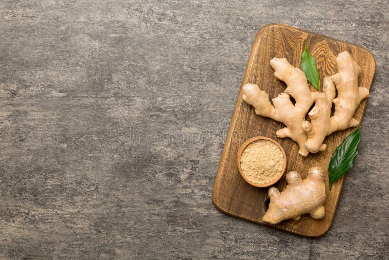 Ginger on Cutting Board Table, Top View. Space for Text Stock Photo ...