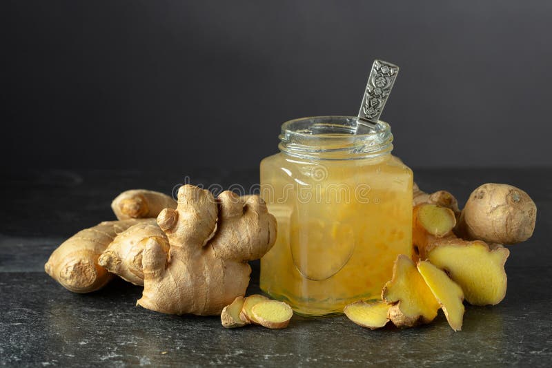 Ginger Jam in Jar and Fresh Ginger on a Black Background Stock Photo ...