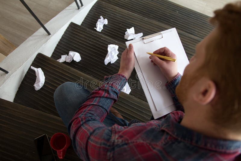 Man Writing in His Notebook at Home. Stock Photo - Image of home ...
