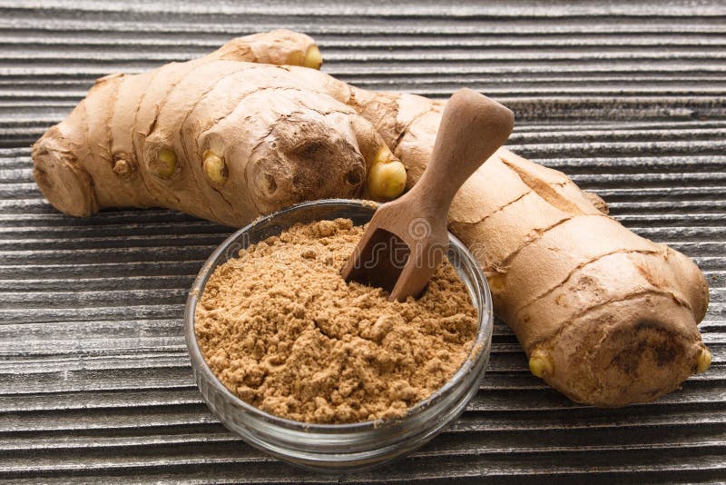 Ginger Root on a Gray Wooden Background Stock Image - Image of ...