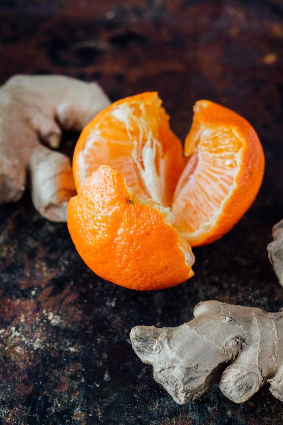 Ginger root with orange stock photo. Image of fruits - 124328018
