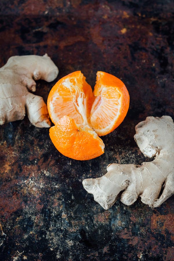 Ginger root with orange stock image. Image of vegetables - 87450197
