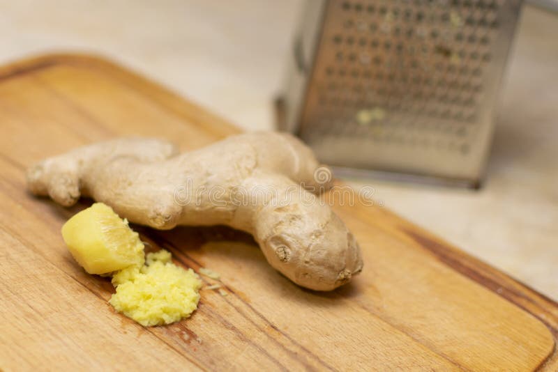 Ginger Root and a Piece of Grated Ginger Root Stock Image - Image of ...