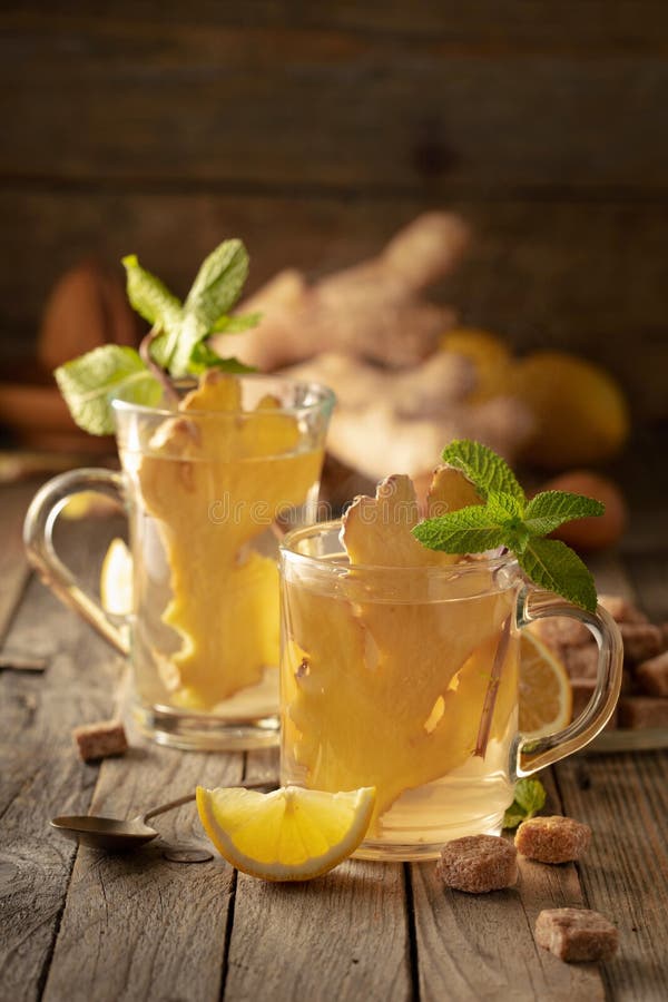 Ginger Tea with Ingredients on an Old Wooden Table Stock Image - Image ...